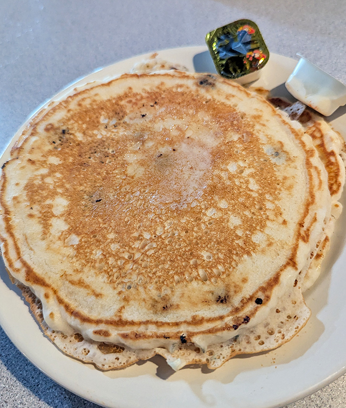 These pancakes aren't just big; they're "I might need to skip lunch" big, with perfect crispy edges and fluffy centers.