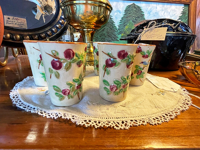 Delicate cherry blossom cups resting on handmade lace – proof that sometimes the smallest treasures carry the most charm and evoke the strongest memories.