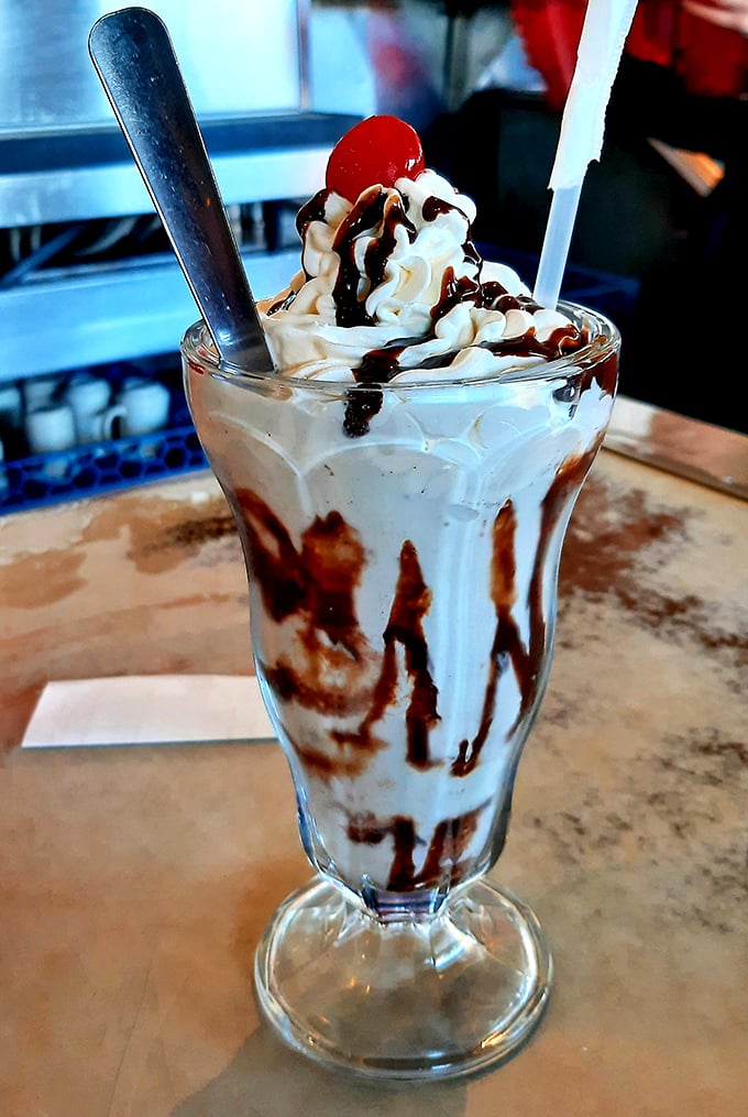 This isn't just a milkshake—it's architecture with a cherry on top. Structural integrity has never been so deliciously threatened.