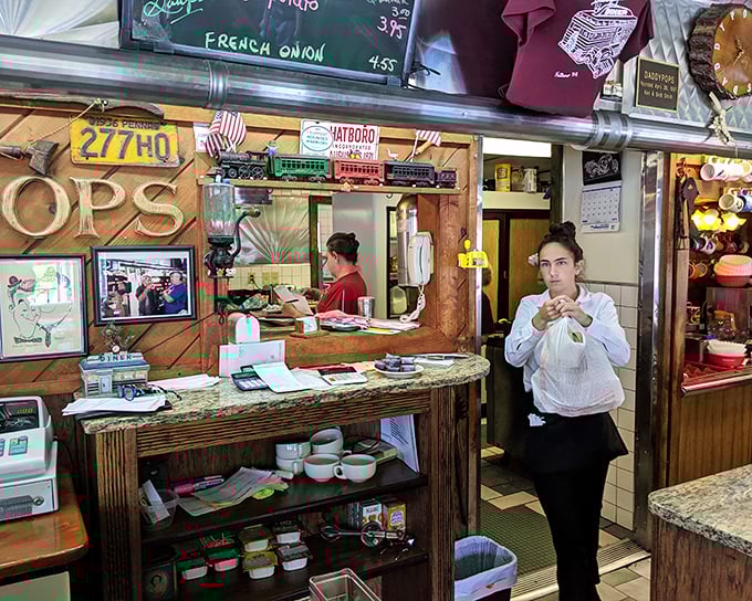 Behind the counter is where the magic happens—a glimpse into the choreographed chaos that delivers those perfect plates to hungry patrons.
