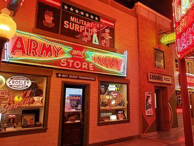 The Army & Navy Store sign glows with military precision, a perfect example of how post-war businesses used neon to welcome returning GIs to civilian life.