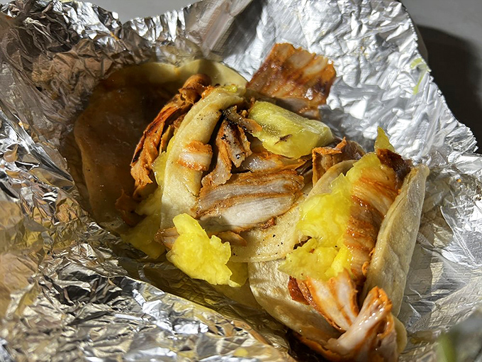 That moment when thinly-sliced al pastor and pineapple meet on a fresh tortilla—it's like witnessing a perfect first date.