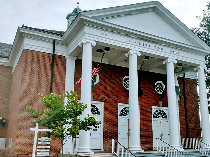 Ligonier Town Hall's stately columns and brick façade give small-town governance a dignity that most big-city buildings can only dream about.