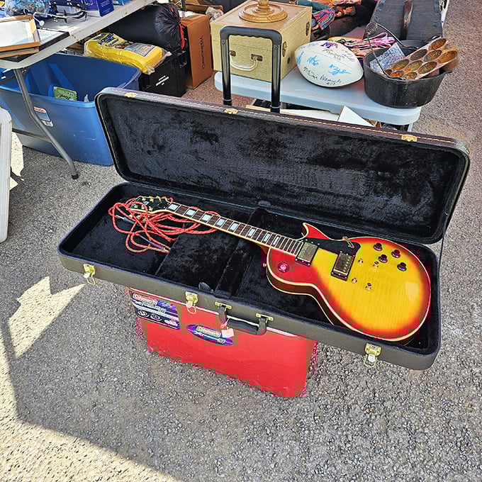 Rock and roll dreams in sunburst finish. This vintage Les Paul-style guitar isn't just an instrument—it's six strings of pure possibility.