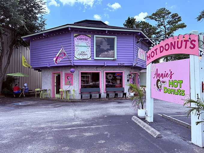Purple and pink perfection that looks like Willy Wonka decided to open a donut shop.