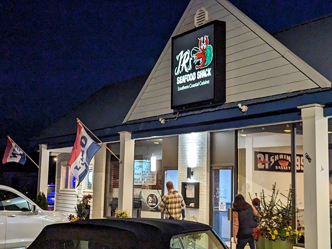 JR's modest exterior glows with possibility at night—a Southern seafood sanctuary waiting to be discovered.