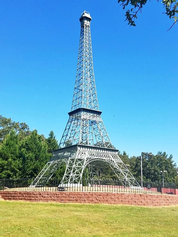 Paris, Tennessee's unexpected Eiffel Tower replica stands tall against blue skies—no passport required for this charming surprise.