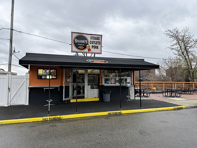 Shank's modest stand proves great cheesesteaks don't need fancy digs—just quality ingredients and sandwich-making know-how.