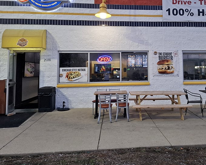 This bright white building with yellow accents is like a burger lighthouse guiding you to halal deliciousness.