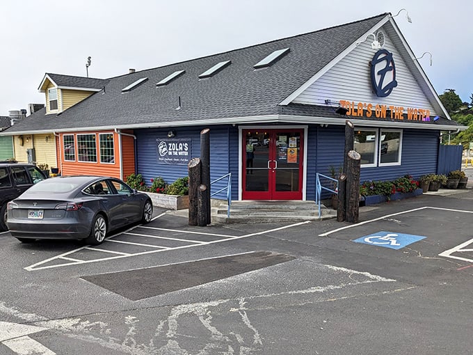 Zola's blue and white exterior looks like it belongs on a coastal postcard—simple, cheerful, and promising seafood-adjacent pizza perfection.