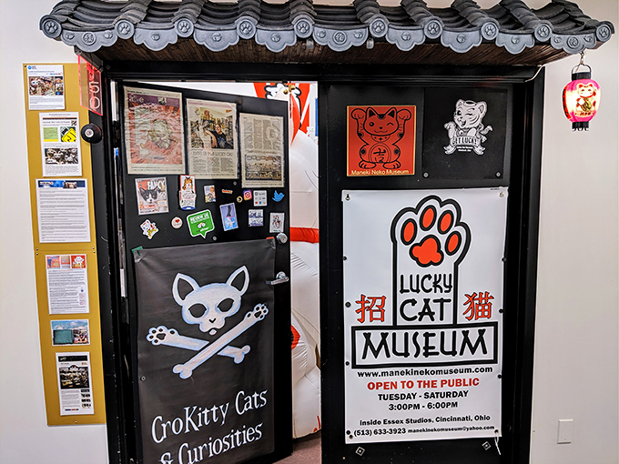 The Lucky Cat Museum's distinctive doorway promises good fortune and feline fun. Wave back at them—it's only polite!