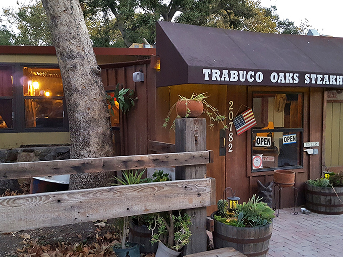 Leave your neckties at home unless you want them hanging from the ceiling—this woodland steakhouse means business.