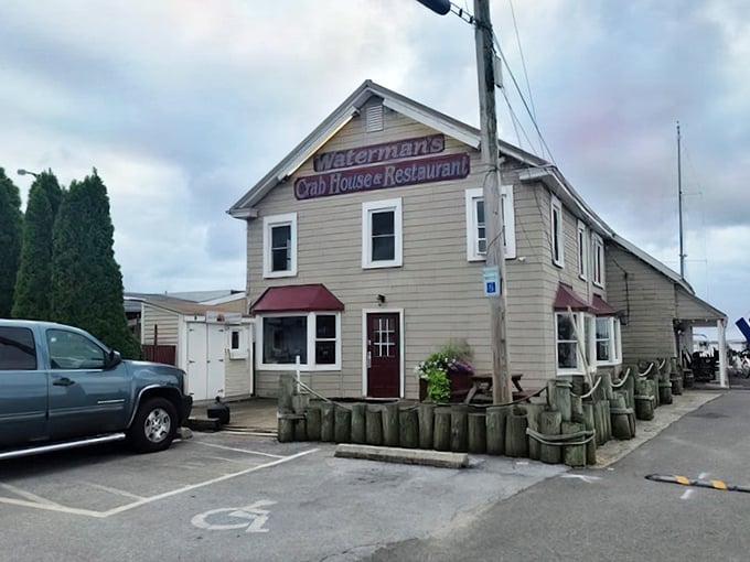 Waterman's Crab House: Simple beige exterior, purple sign – this unassuming building houses some of Maryland's most legendary crab feasts.
