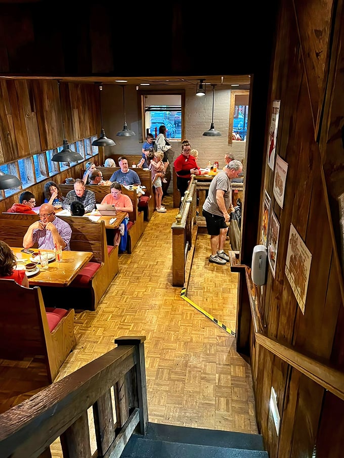 The cozy dining area proves great barbecue doesn't need fancy surroundings – just honest wood, comfortable seating, and the promise of flavor.