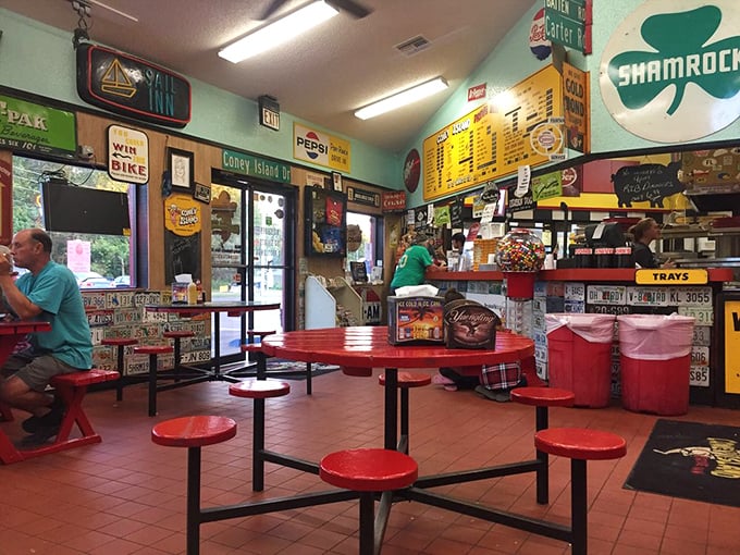 Every inch of wall space tells a story – vintage signs, license plates, and memorabilia create the kind of authentic atmosphere money can't manufacture.