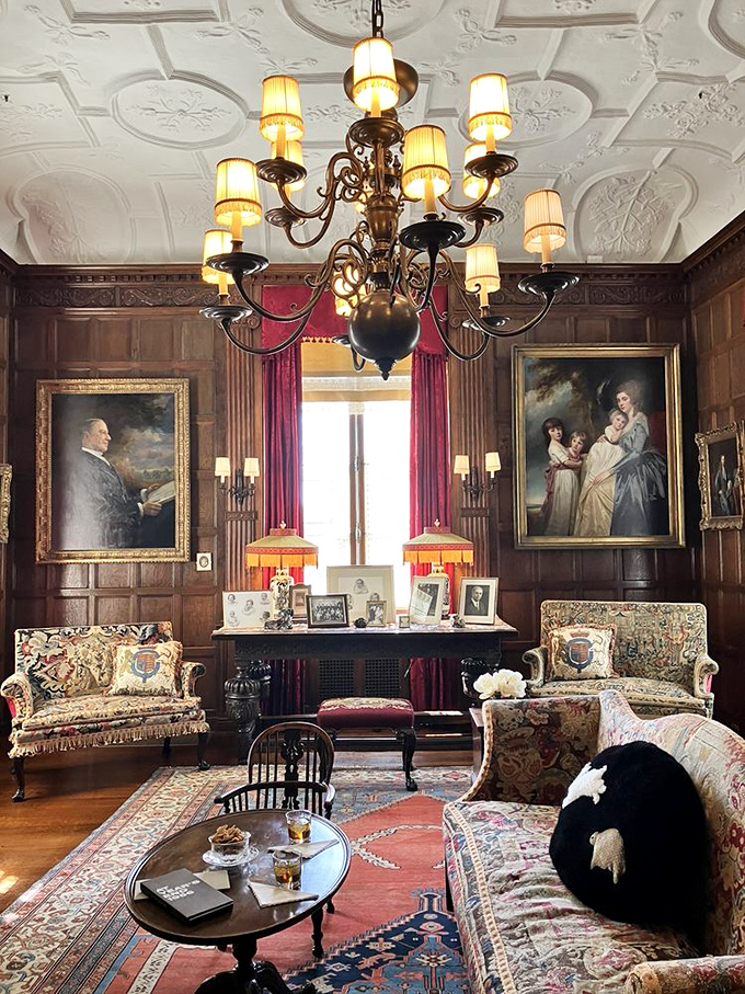 A living room where even your best behavior feels inadequate. Those portraits have been judging visitors for generations.