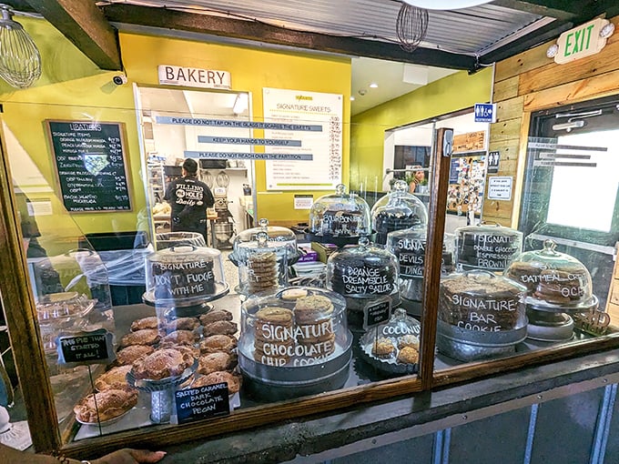 The bakery case showcases edible art pieces that make choosing just one treat feel like an impossible mission.
