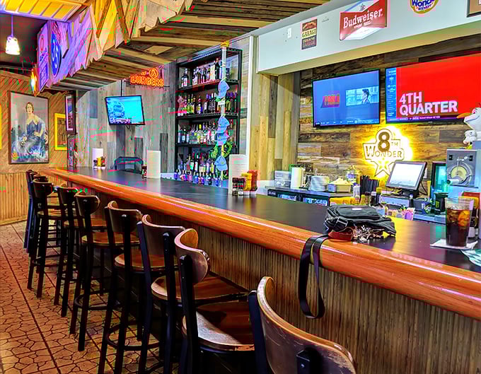 The bar area balances sports-watching practicality with enough Texas charm to make even waiting for a table feel like part of the experience.