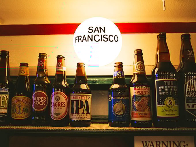 The beer selection includes Portuguese Sagres alongside local craft brews—a perfect metaphor for this diner's beautiful cultural fusion.