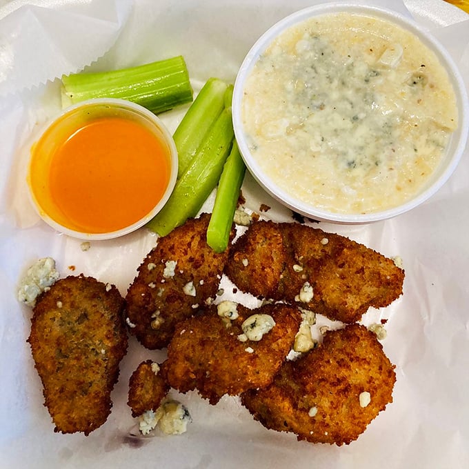These golden-fried buffalo oysters with blue cheese crumbles aren't just appetizers—they're conversation starters that might just steal the whole show.
