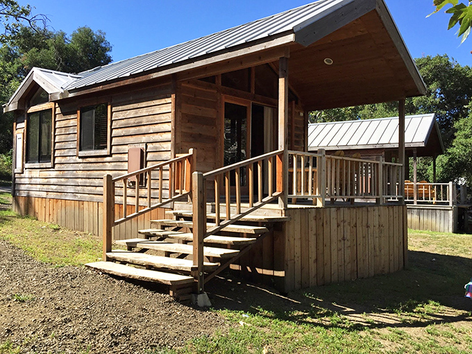 These rustic cabins aren't just accommodations—they're your temporary address in paradise, no utility bills included.
