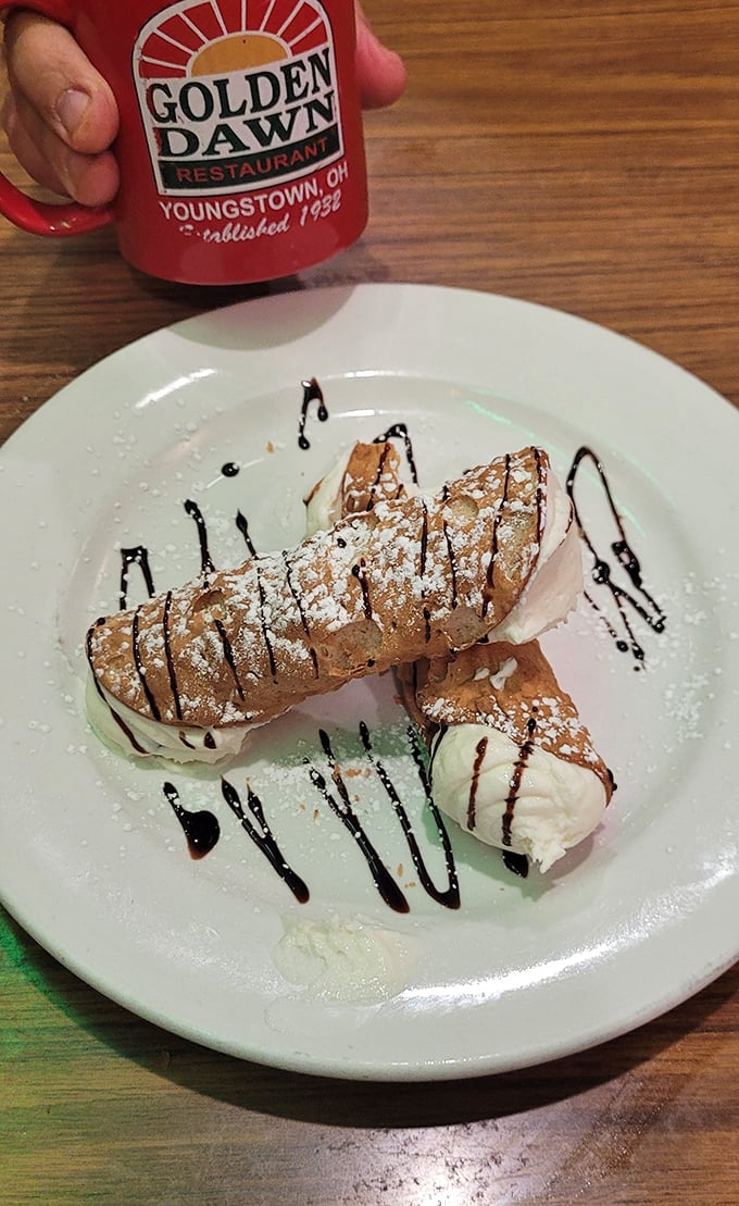 These cannolis aren't just dessert, they're an exclamation point at the end of a meal—crisp shells, sweet filling, chocolate drizzle.
