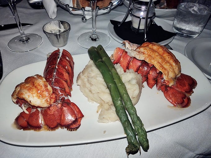 Lobster tails and mashed potatoes with asparagus standing at attention—a plate that says, "Yes, you've made excellent life choices today."