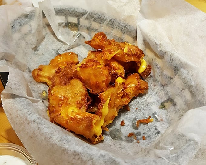 Wisconsin's favorite deep-fried ambassador. These cheese curds have that perfect squeak-then-melt quality that separates the authentic from the imitators.