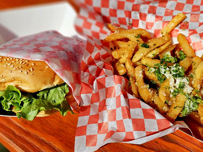 Half sandwich, half fries, all happiness. Those garlic fries aren't just a side dish—they're the co-star in this delicious coastal production.