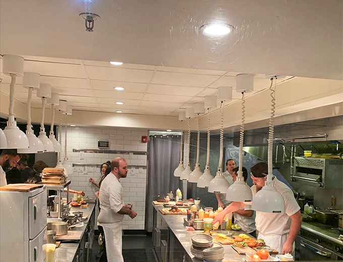 The kitchen ballet—where tortilla-making is both art form and Olympic sport. These aren't cooks; they're keepers of tradition.