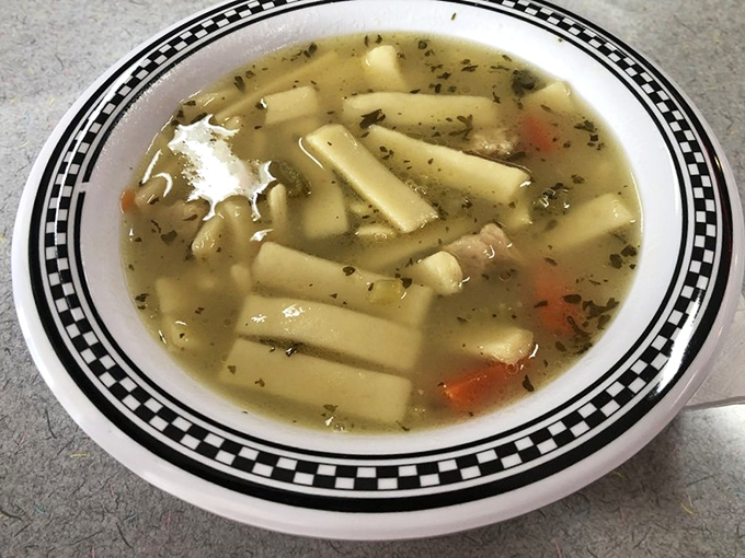 Chicken noodle soup that would make grandma nervous about her recipe. Those thick, hearty noodles swimming in golden broth are the ultimate comfort.