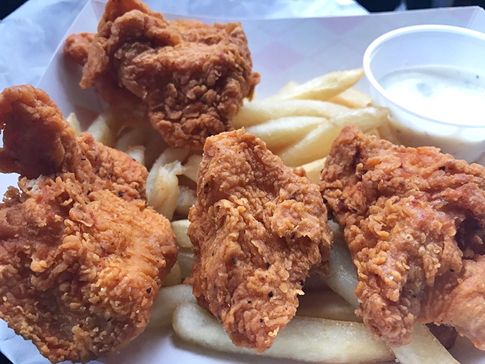 Chicken tenders and fries—proof that sometimes the "kid's meal" is secretly what every adult wants to order too.
