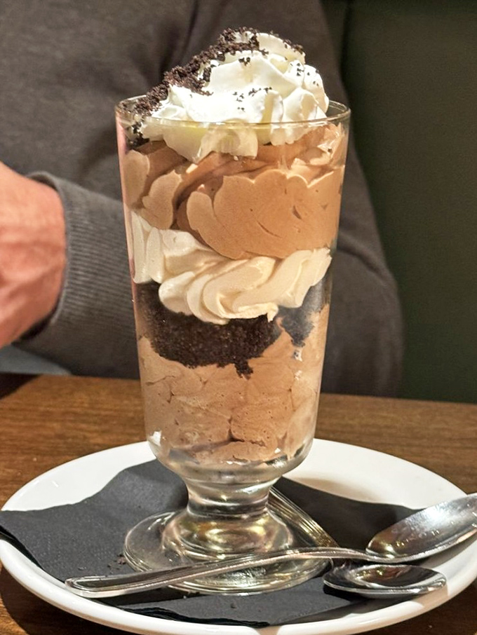 Layers of chocolate mousse and cream create a dessert skyscraper that makes you wonder why anyone bothers with plain old chocolate cake.
