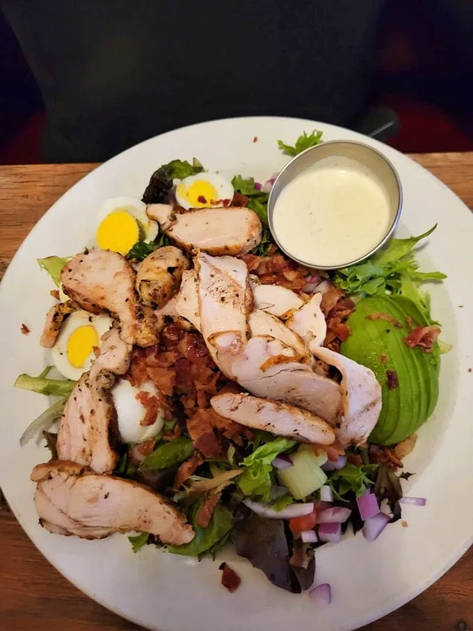 This Cobb salad with grilled chicken is what happens when vegetables dress up for a special occasion. Avocado and bacon make everything better.