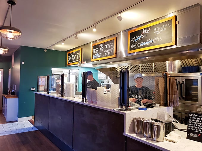 The open kitchen design lets you witness the fried chicken alchemy. Like watching artists at work, if art made your mouth water.