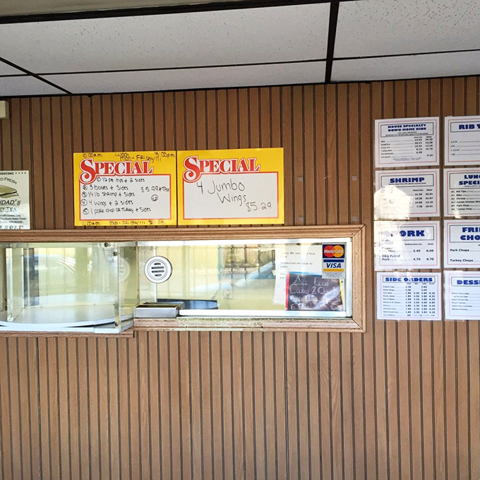 The ordering window – where dreams are spoken aloud and then transformed into edible reality. Note the handwritten specials!