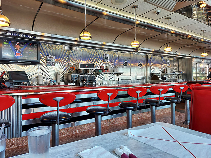 The counter—where solo diners become temporary family and the coffee keeps flowing like conversation between old friends.