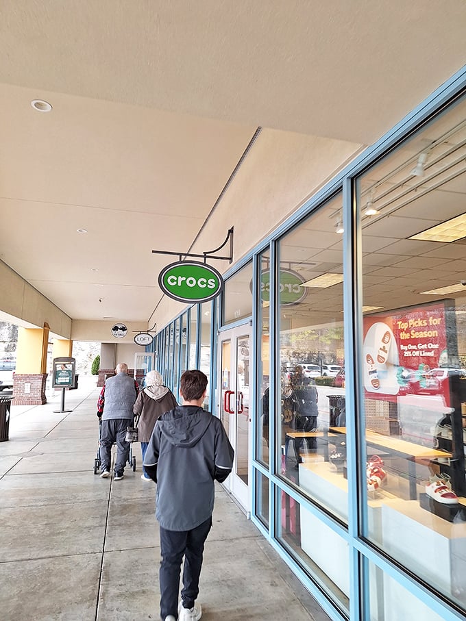 The distinctive Crocs sign guides comfort-seekers to their destination. For some shoppers, practical footwear trumps fashion—especially at outlet prices.