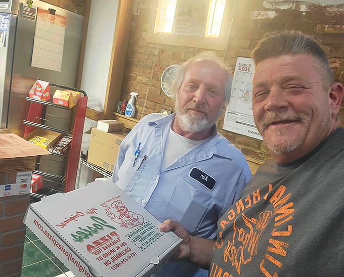 Where pizza stories and neighborhood legends are exchanged alongside the day's special—the true ingredients of community.