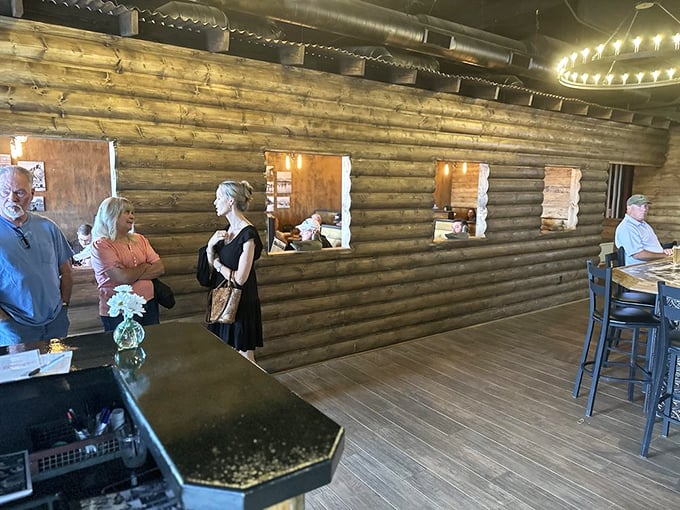 The log cabin walls aren't just decor—they're practically a time machine to when meals were events and conversations weren't interrupted by notifications.