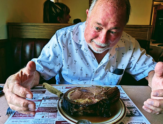 The look on this diner's face says everything words can't—prime rib epiphanies are real, and they're spectacular.