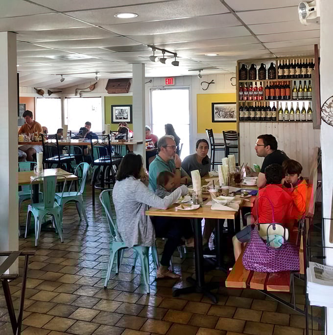A dining room filled with happy faces and the symphony of crab mallets. Some people come for the food, but stay for the company.