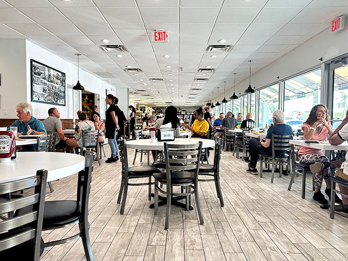 The bustling dining room at Grampa's – where Florida's breakfast faithful gather to worship at the altar of properly cooked eggs and endless coffee.