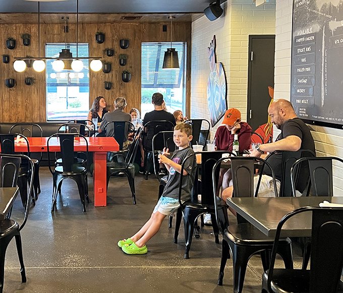 Families gather around tables at Pig Floyd's, proving that great barbecue, like great memories, is best when shared with those you love.