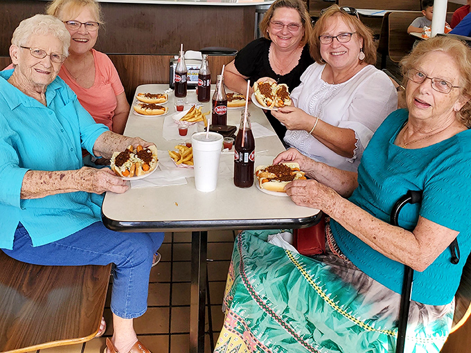 Multi-generational dining at its finest – where grandmothers and granddaughters bond over shared plates and timeless comfort food traditions.