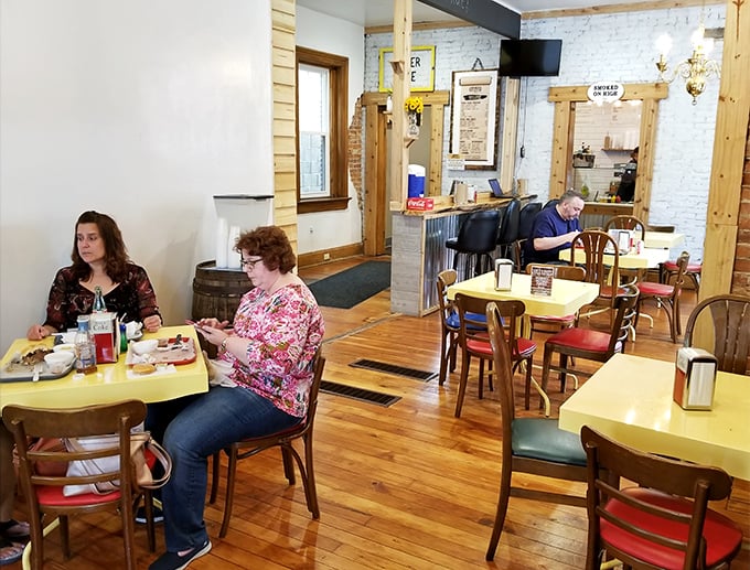 The dining room buzzes with the satisfied murmurs of people having religious experiences with smoked meat. No phones necessary—just focus on the food.