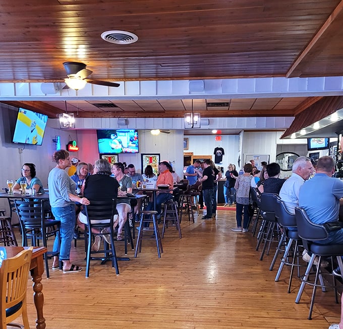 The bustling dining area proves that good food creates community—strangers becoming friends over shared appreciation of barbecue excellence.