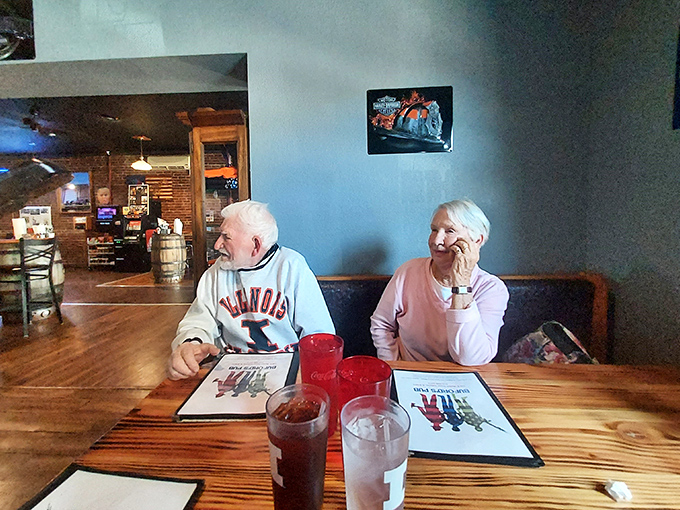 The true heart of Buford's: regulars sharing stories over comfort food, creating the soundtrack every great small-town restaurant needs.