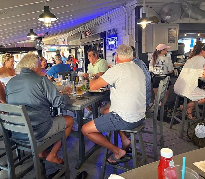 The bustling dining area speaks volumes – locals and tourists alike know where to find the good stuff. Nobody dresses up for great seafood.