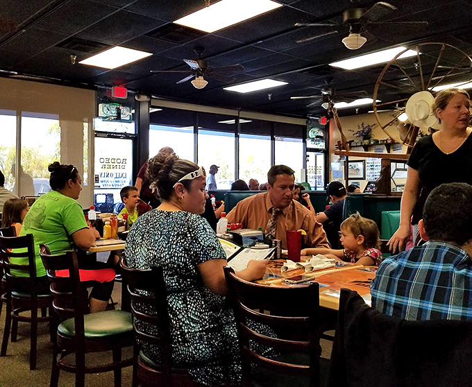 Multi-generational families gathering around tables isn't just a scene—it's the heartbeat of Rodeo Diner, where food brings people together.